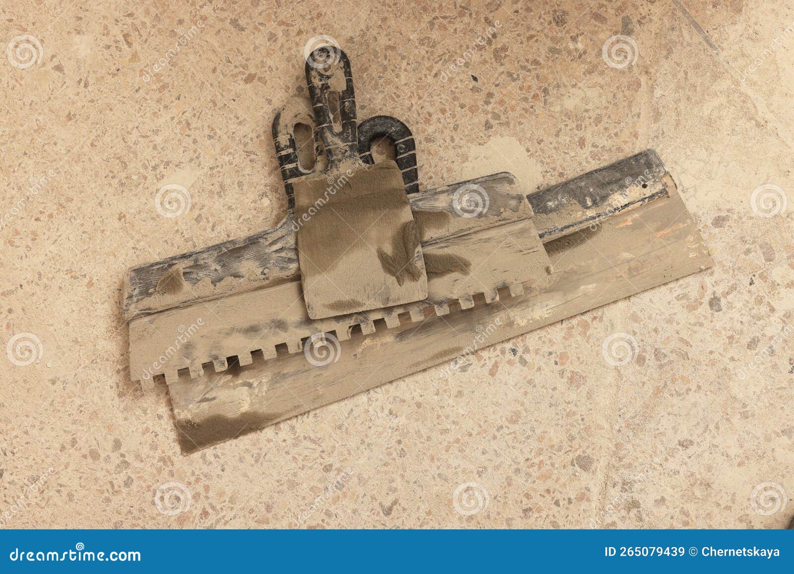 Metal Spatulas on Floor, Above View. Tiles Installation Process Stock ...