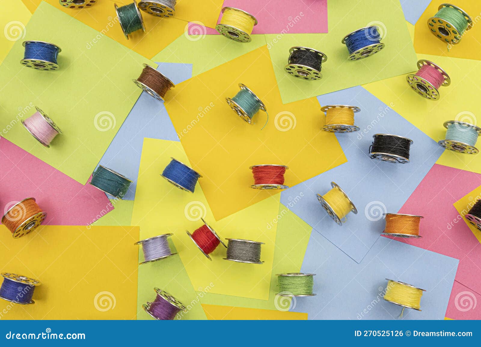 Metal Spools with Multicolored Thread for Sewing Machine on a Table ...