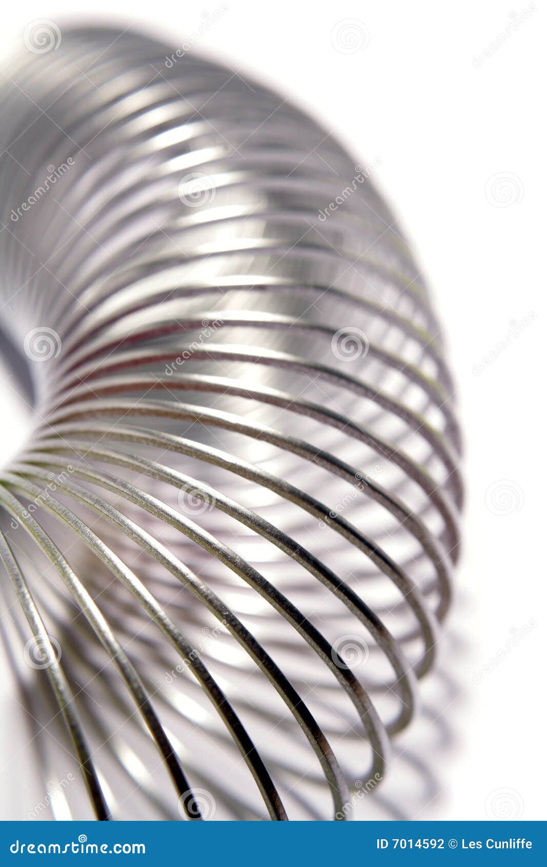 Metal spring coil on white stock photo. Image of white - 7014592