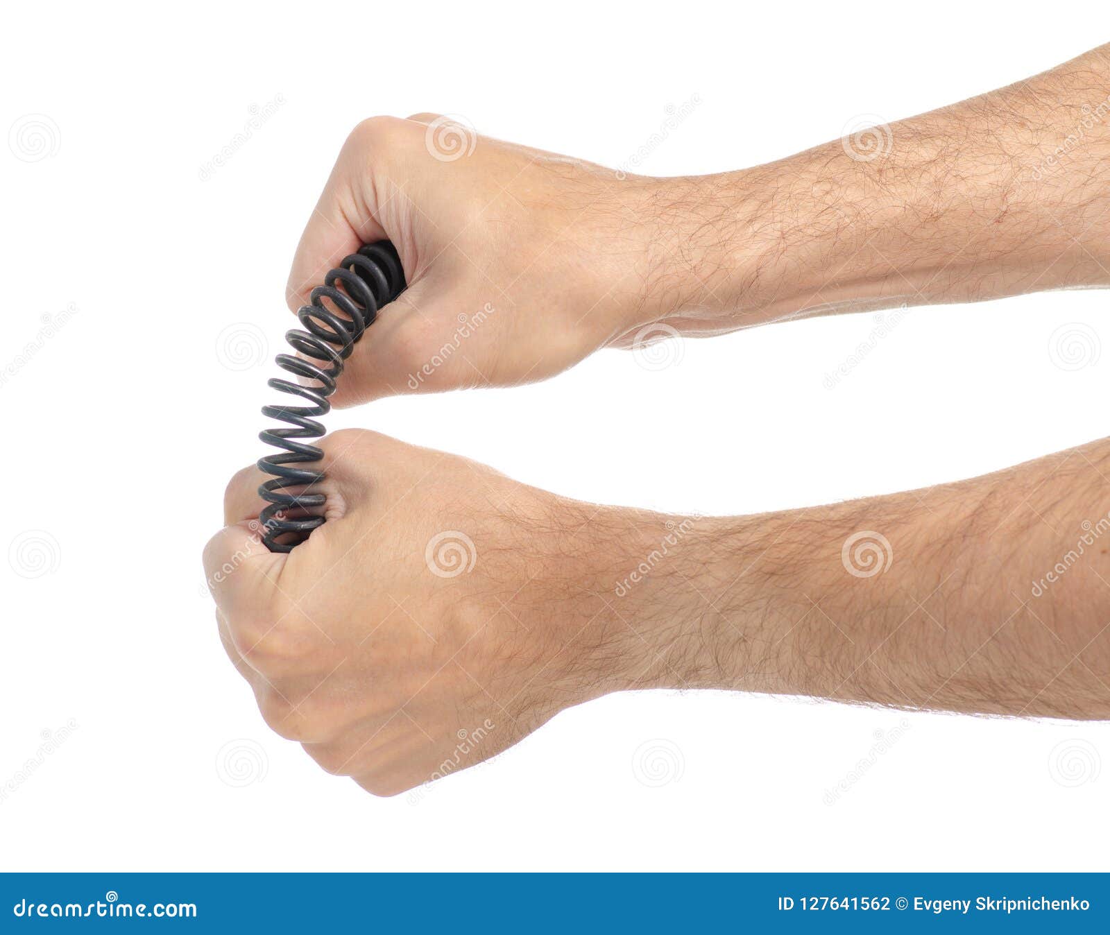 Metal spring in a hand stock photo. Image of male, holding - 127641562
