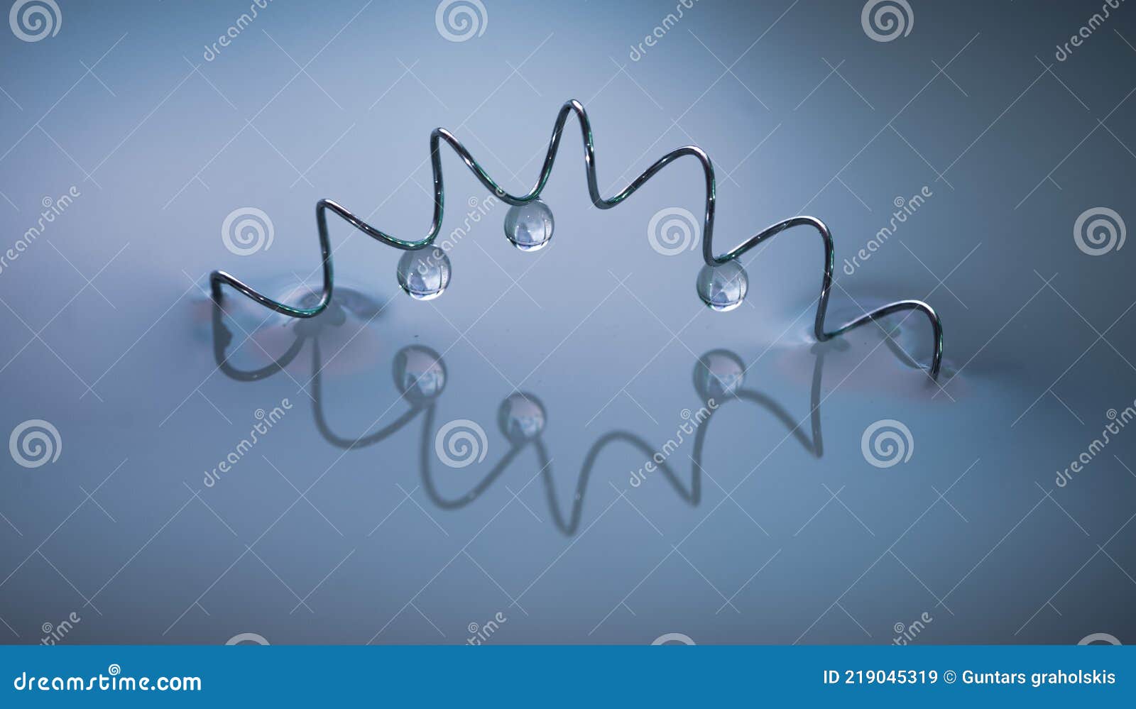 Metal Spring with Water Droplets Reflection Stock Image - Image of ...