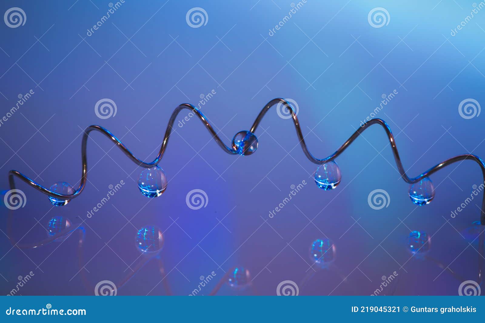 Metal Spring with Water Droplets Reflection Stock Image - Image of ...