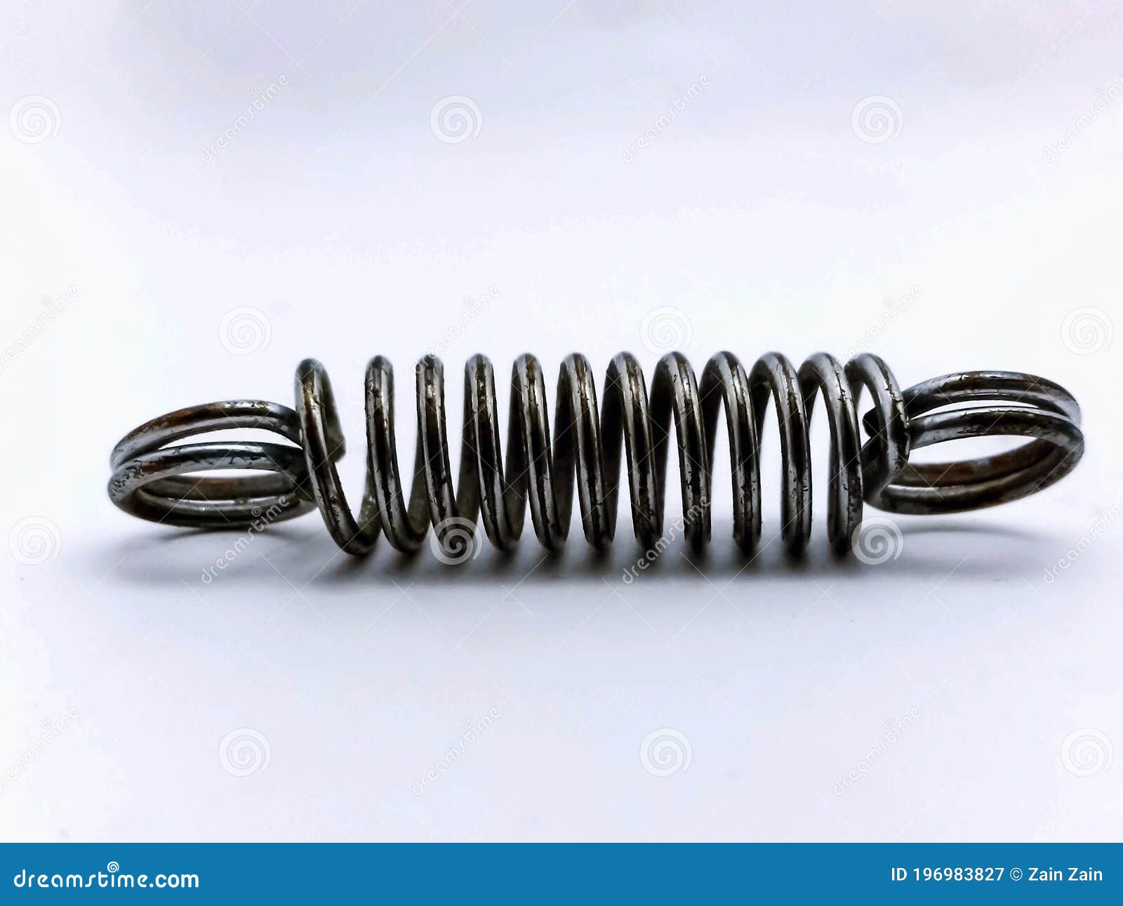 A Metal Spring on White Background Stock Image - Image of jeweler, jump ...