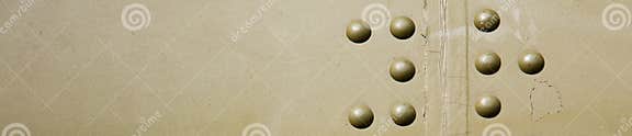Metal strip with rivets stock photo. Image of engraving - 29455360