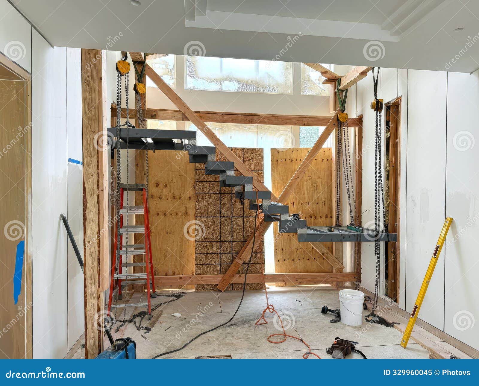 Metal Support Stairs To Second Floor are Being Installed in a New ...