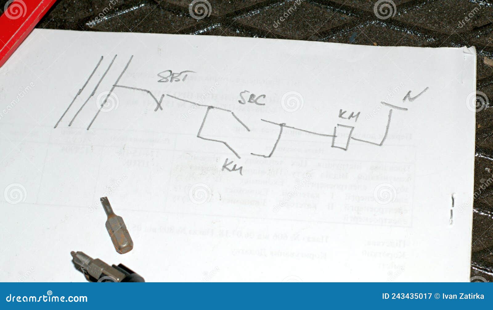 On a Metal Table is a Sheet of Paper with a Drawn Wiring Diagram. Stock ...