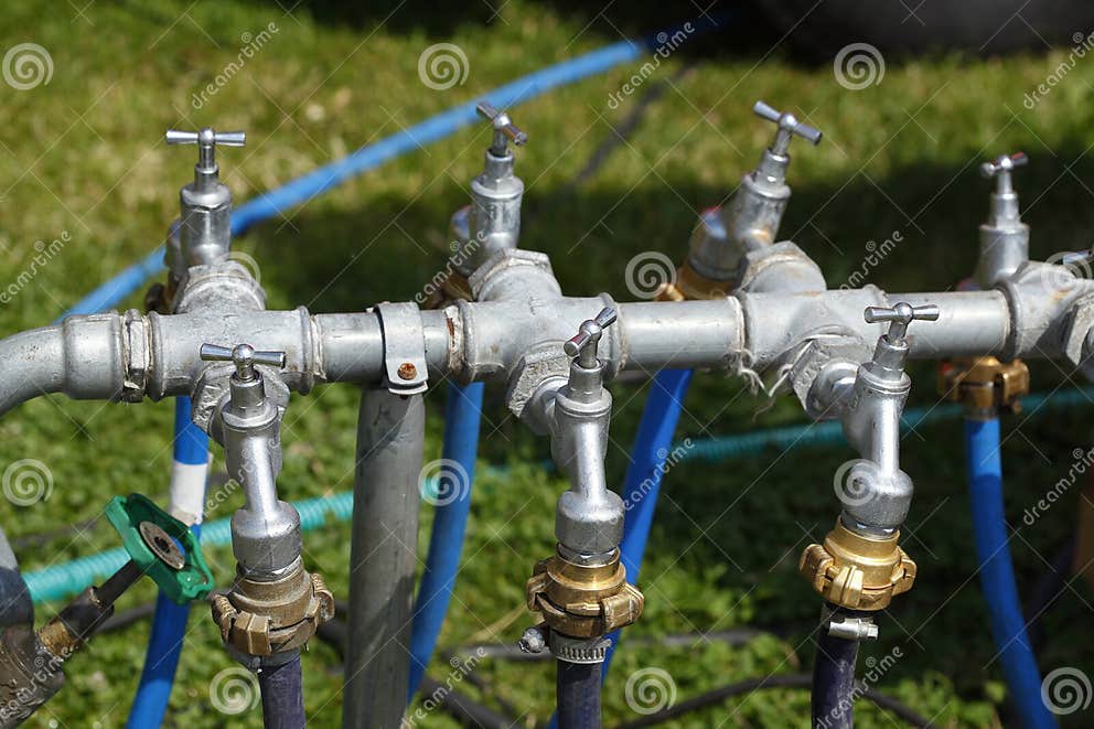 Metal Taps with Multiple Connections Stock Image - Image of metal ...