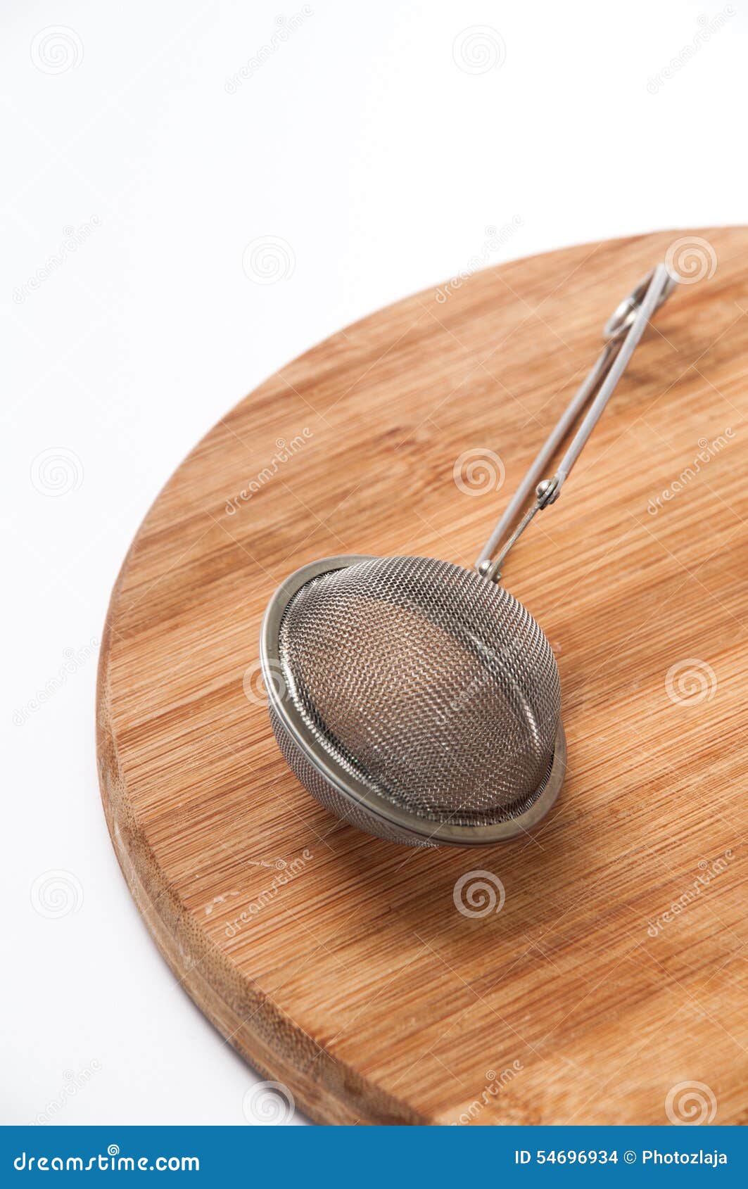 METAL TEA STRAINER CLAMP WOODEN BOARD Stock Photo - Image of wooden ...