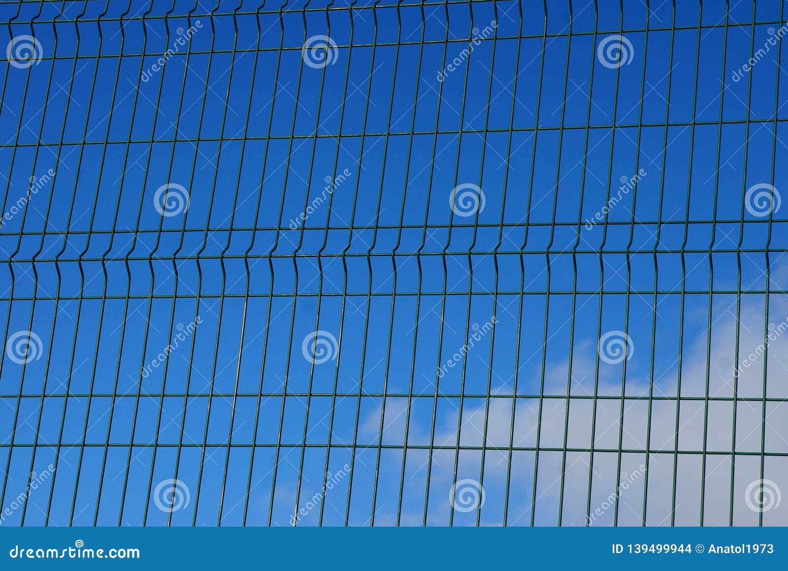 Metal Texture of a Green Iron Grid Against the Sky and Clouds Stock ...