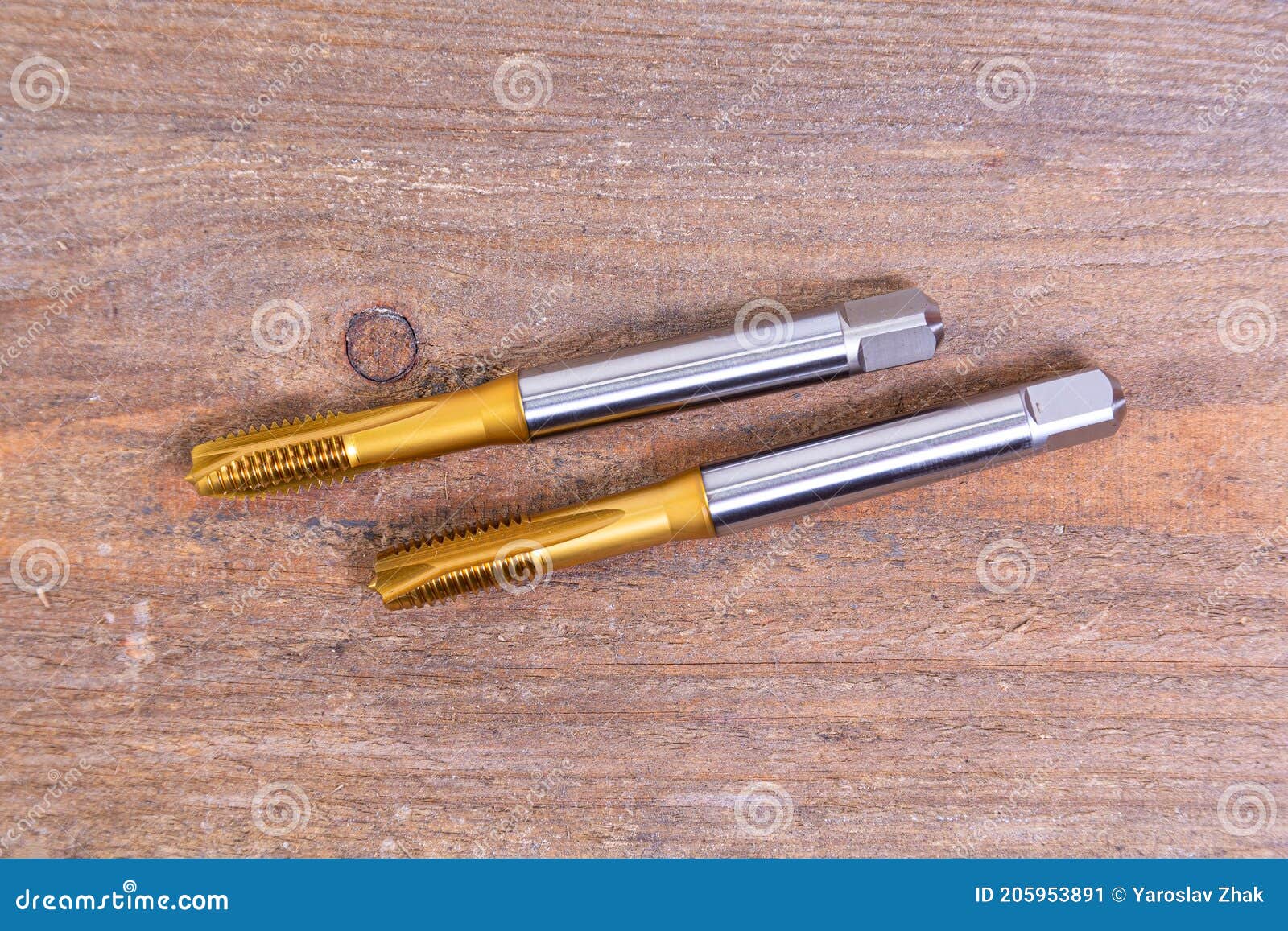 Metal Threading Taps. Tool for Processing Metal on a Wooden Board Stock ...