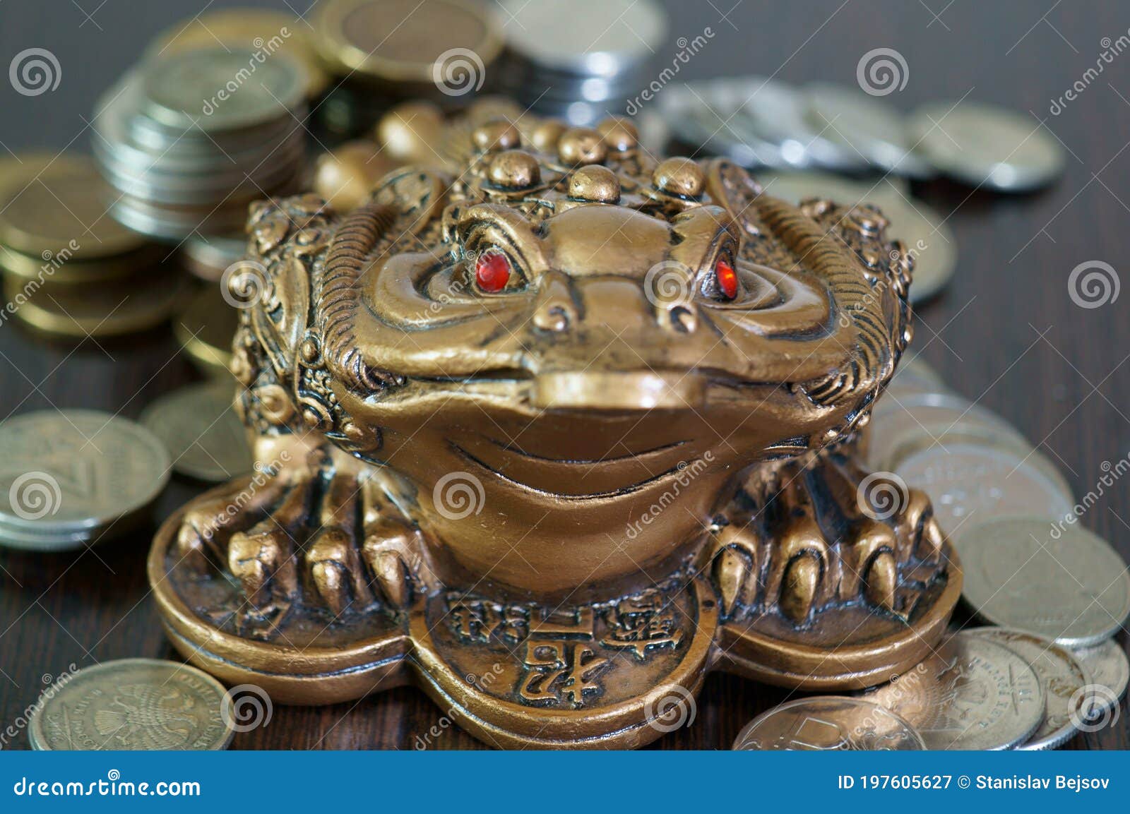 A Metal Toad Next To a Stack of Coins. Stock Image - Image of success ...