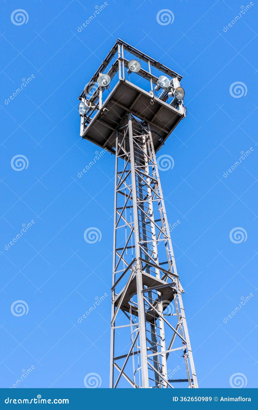 Metal Tower with Lights Industry Object in the Blue Sky Vertical Stock ...