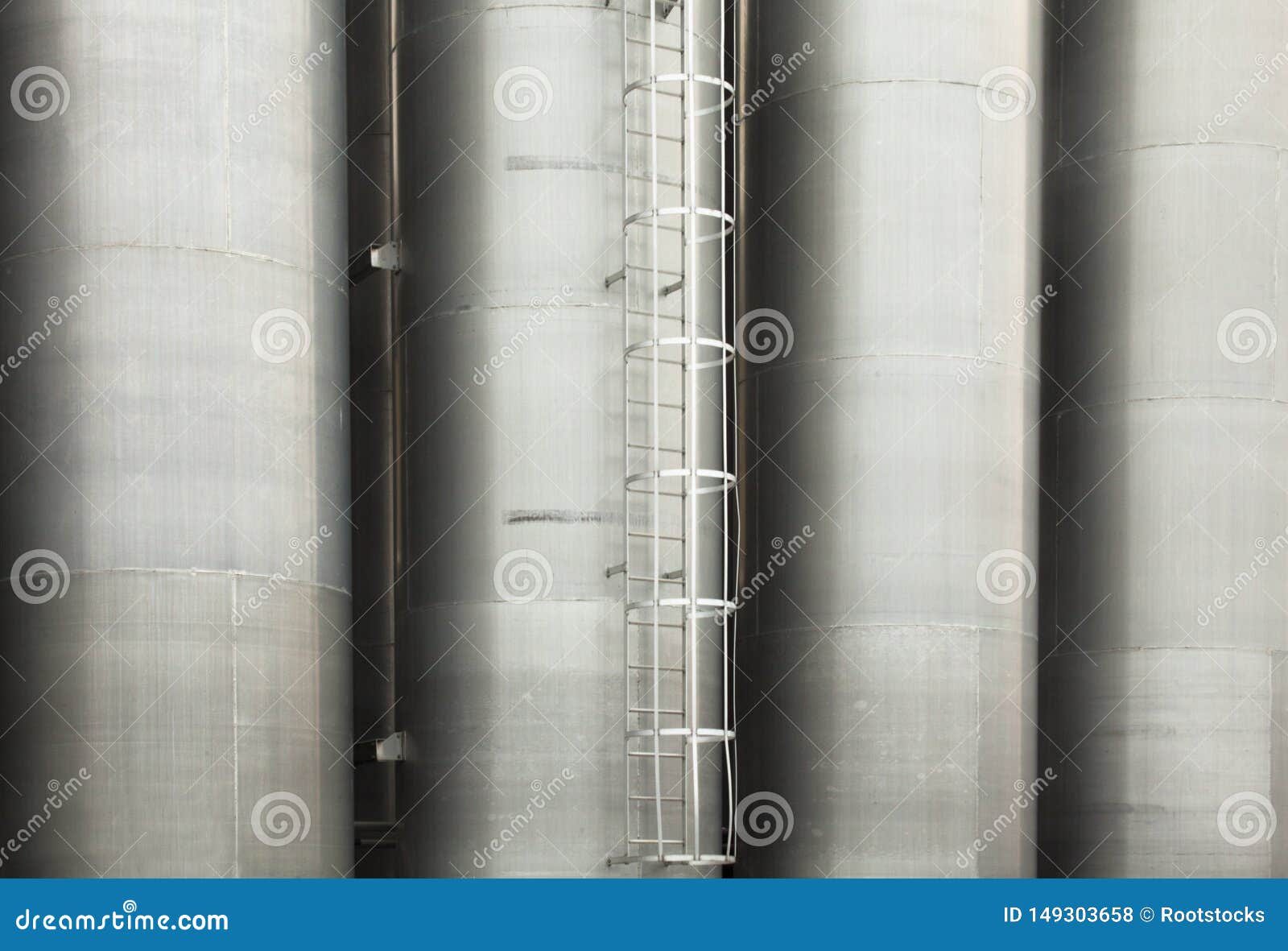 Metal Tower Silos of the Industrial Plant Stock Photo - Image of black ...
