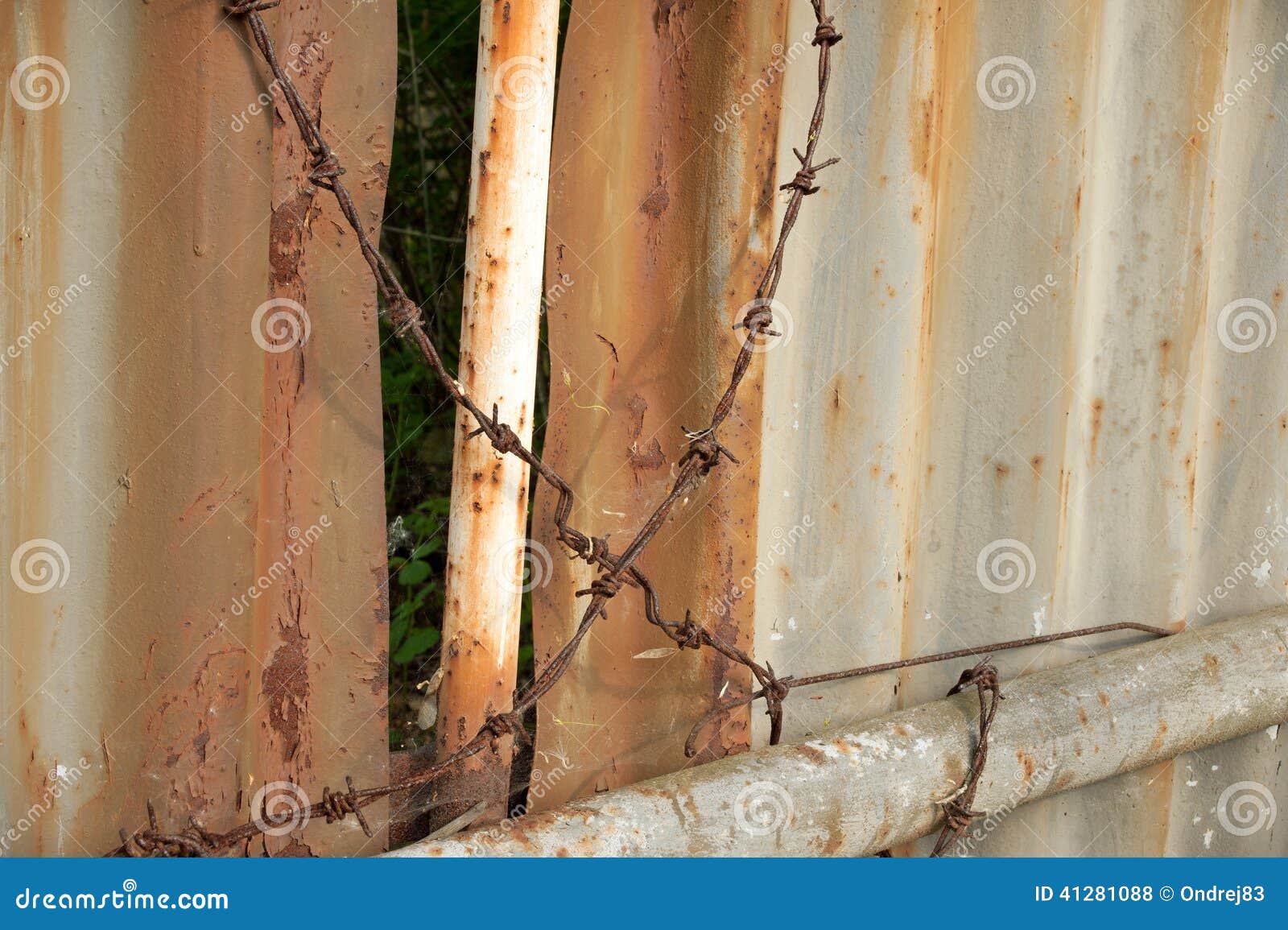 Metal wall and barbed wire stock photo. Image of wired - 41281088