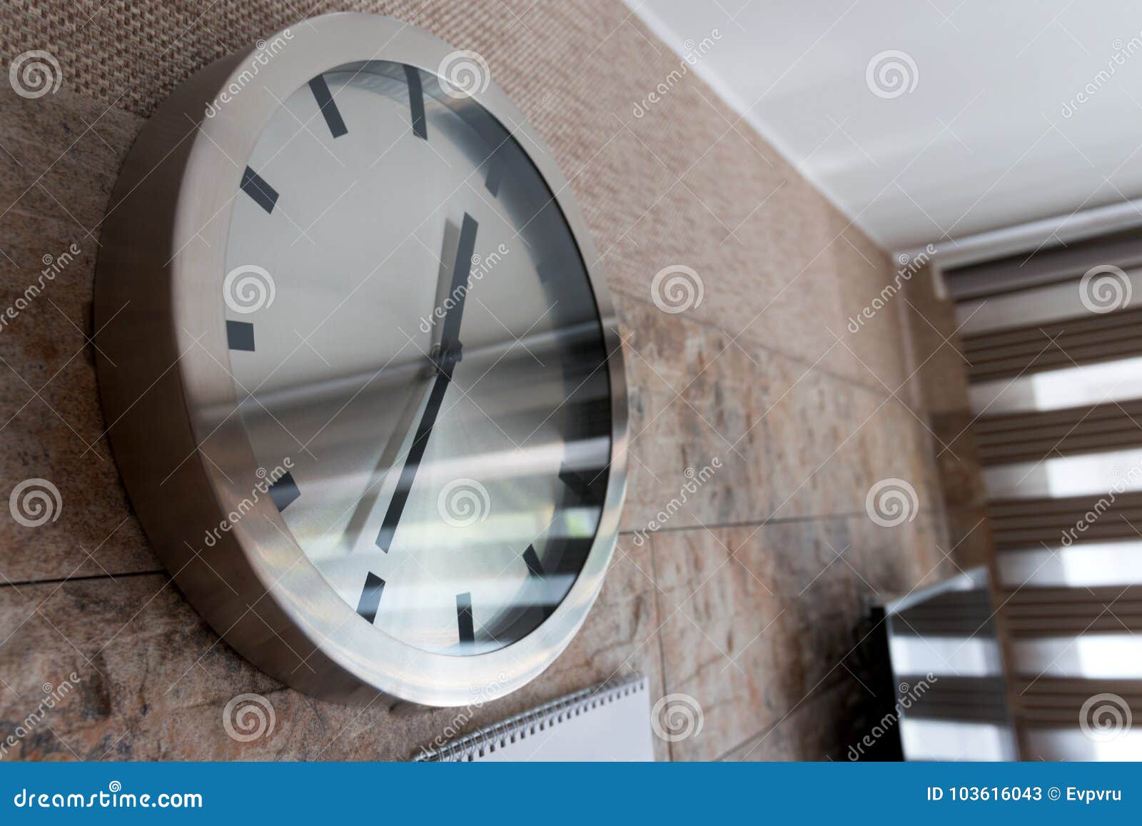 Metal watch on the wall stock image. Image of modern - 103616043