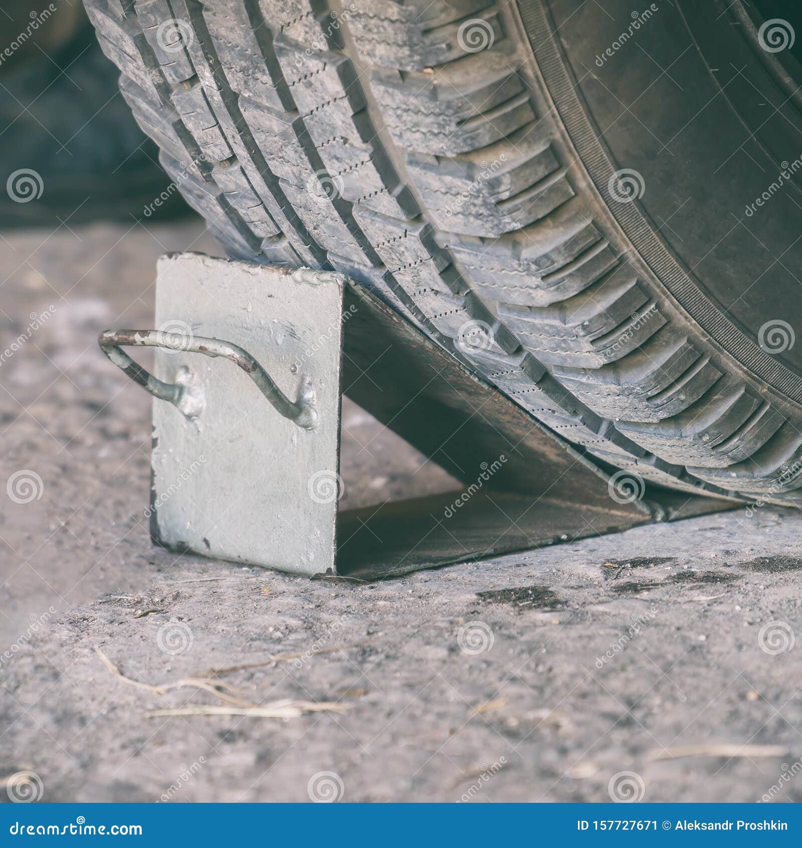 Metal Wheel Chock for Car Wheel Stock Image - Image of profile, metal ...