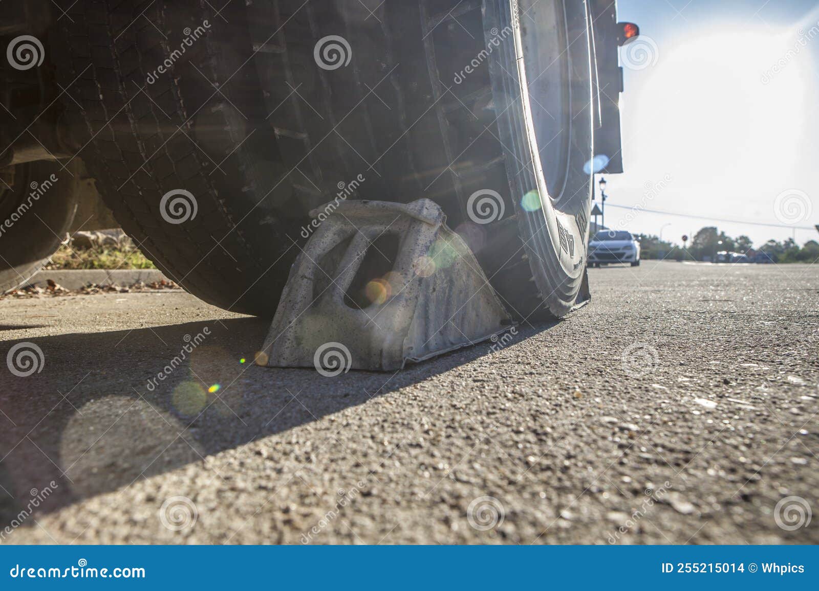 Metal Wheel Chock Under Trailer Stock Photo - Image of hilly, flares ...