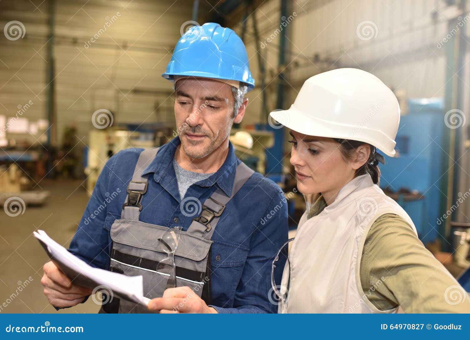 Metal Worker Explaining Young Apprentice Techniques Stock Image - Image ...