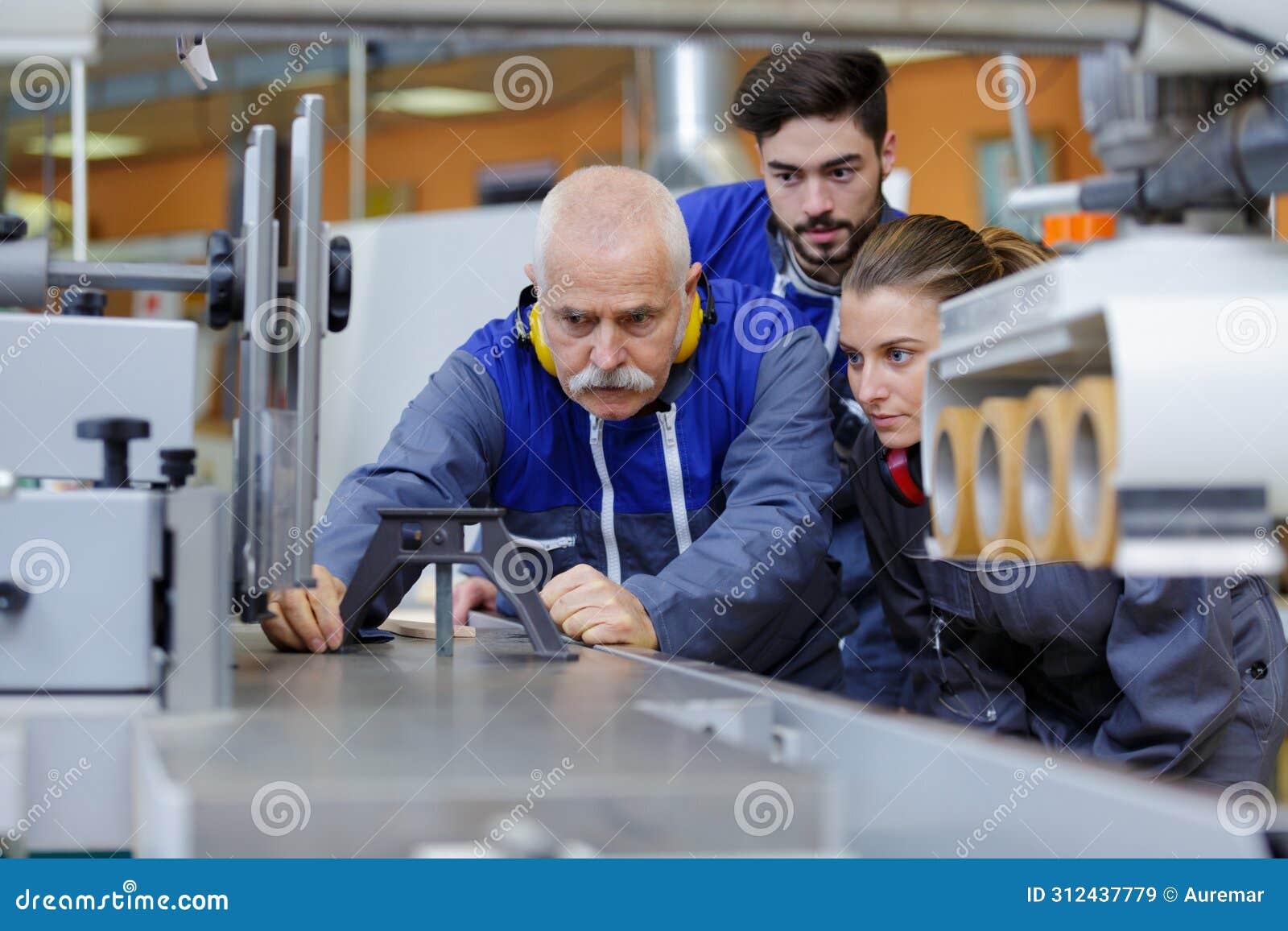 Metal Worker Showing Machine Room To Apprentice Stock Image - Image of ...