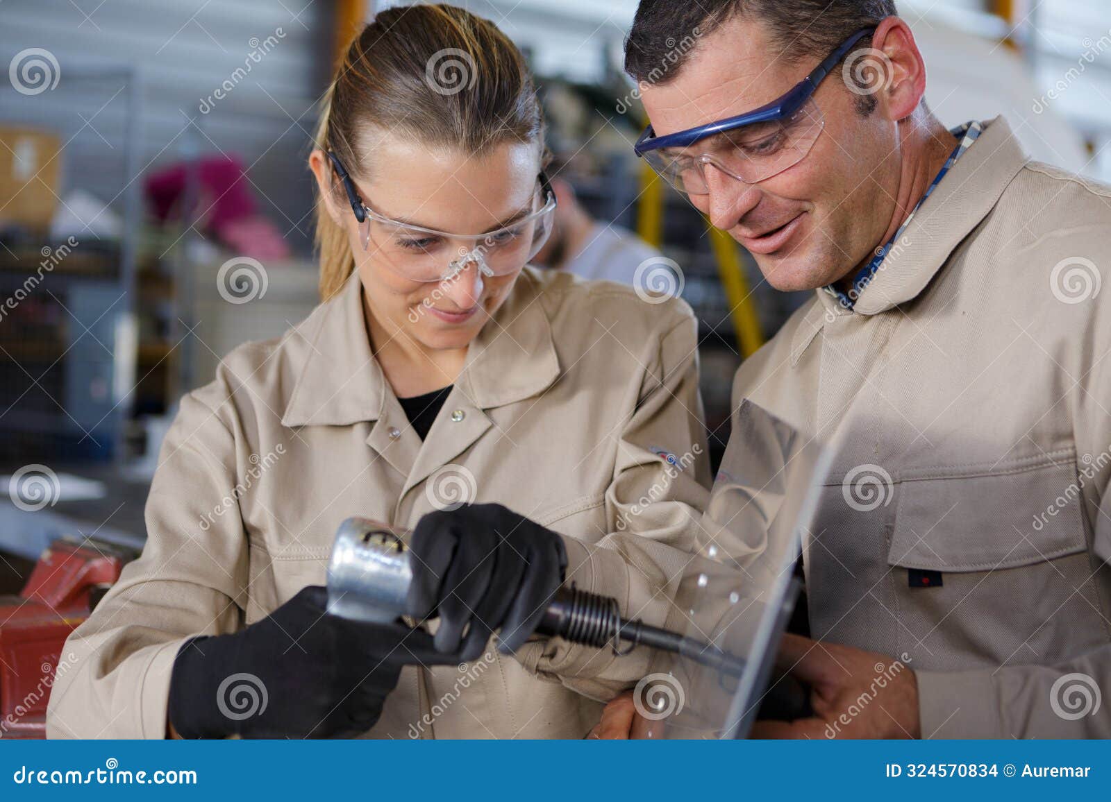 Metal Worker Showing Machine Room To Apprentice Stock Photo - Image of ...