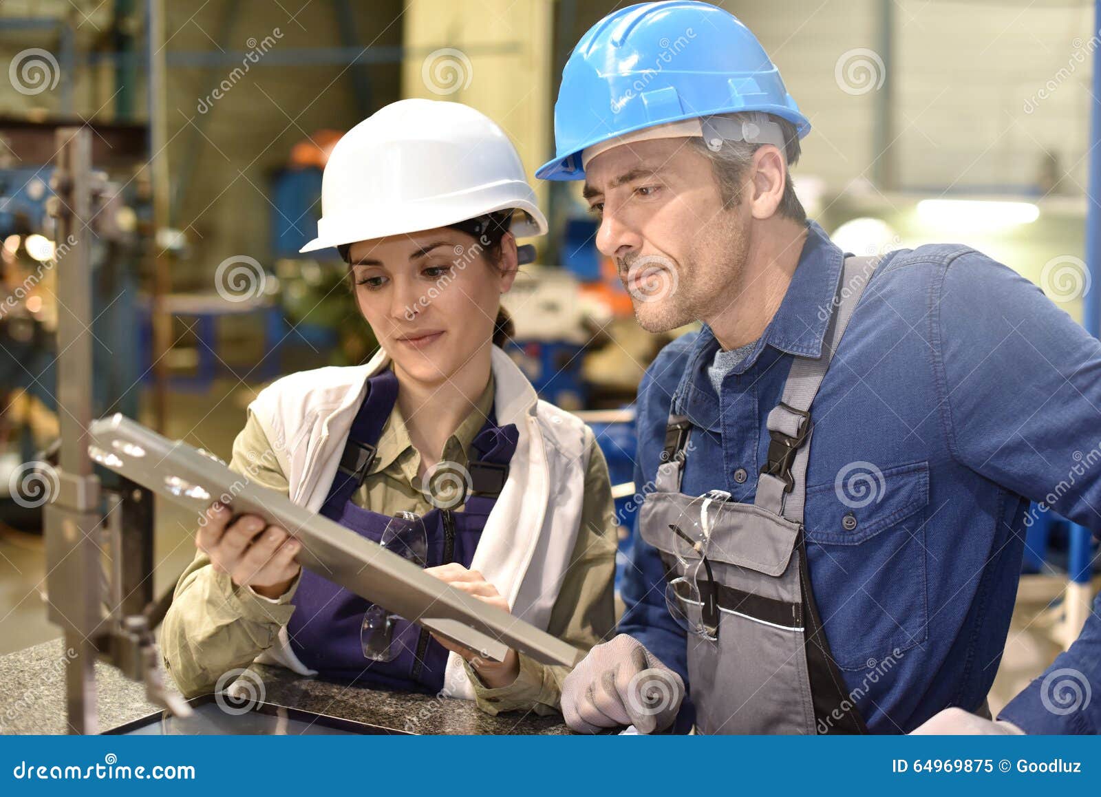 Metal workers at workshop stock image. Image of factory - 64969875