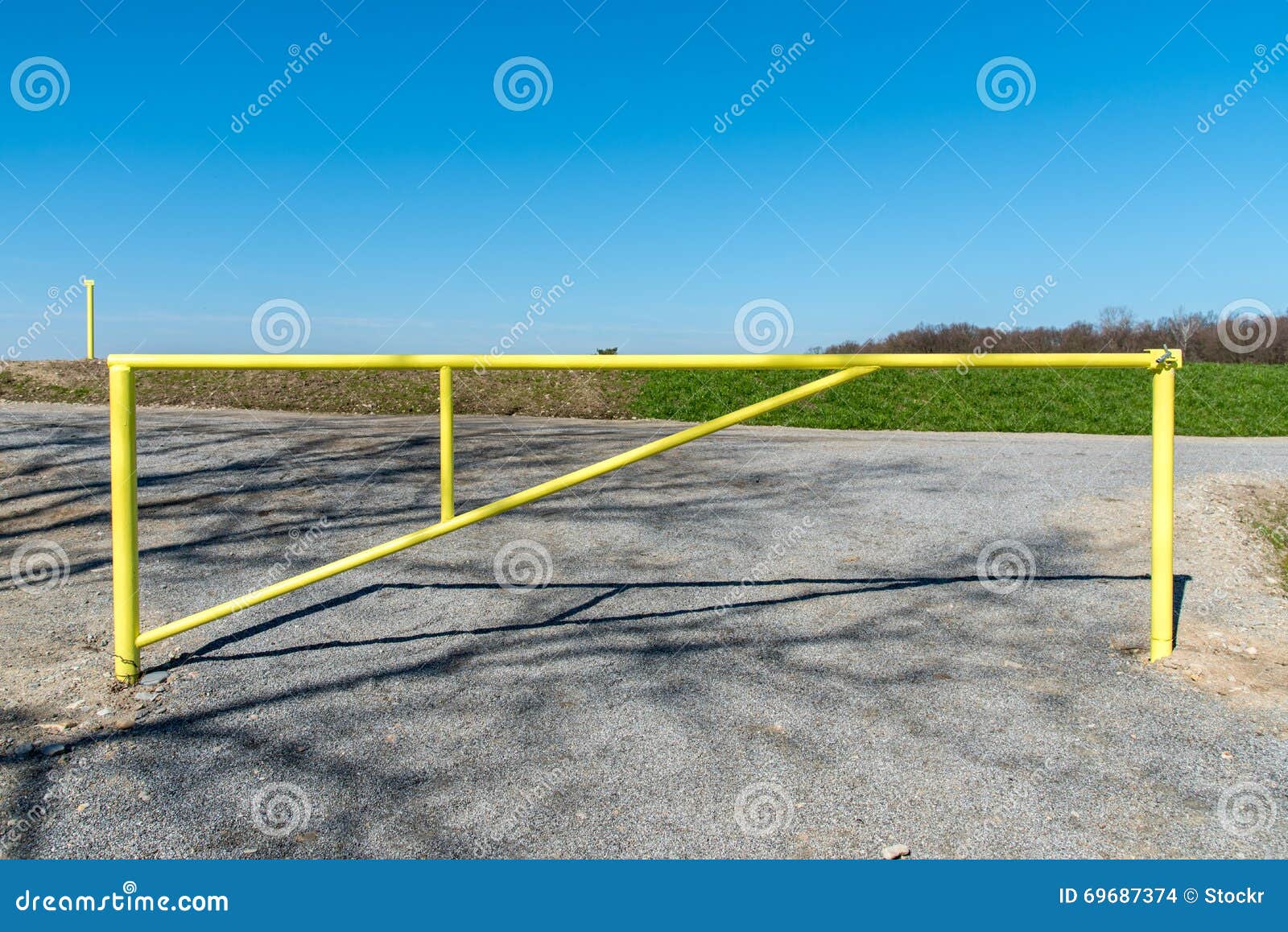 Metal yellow railing stock photo. Image of barriers, roadblocks - 69687374