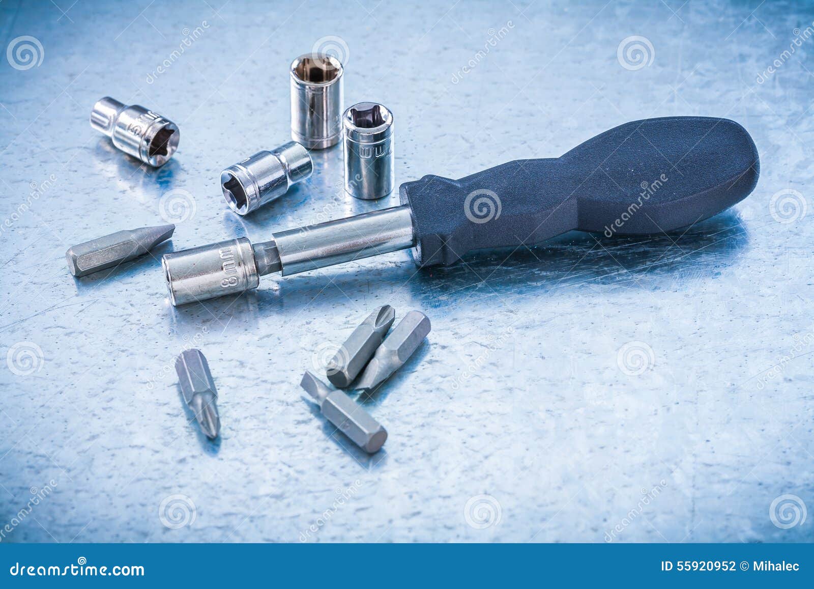 Metallic Background with Black Screwdriver and Group of Steel Sc Stock ...