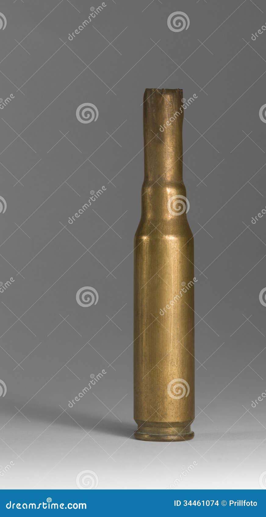 Metallic Bullet Casing in Grey Back Stock Photo - Image of clipping ...