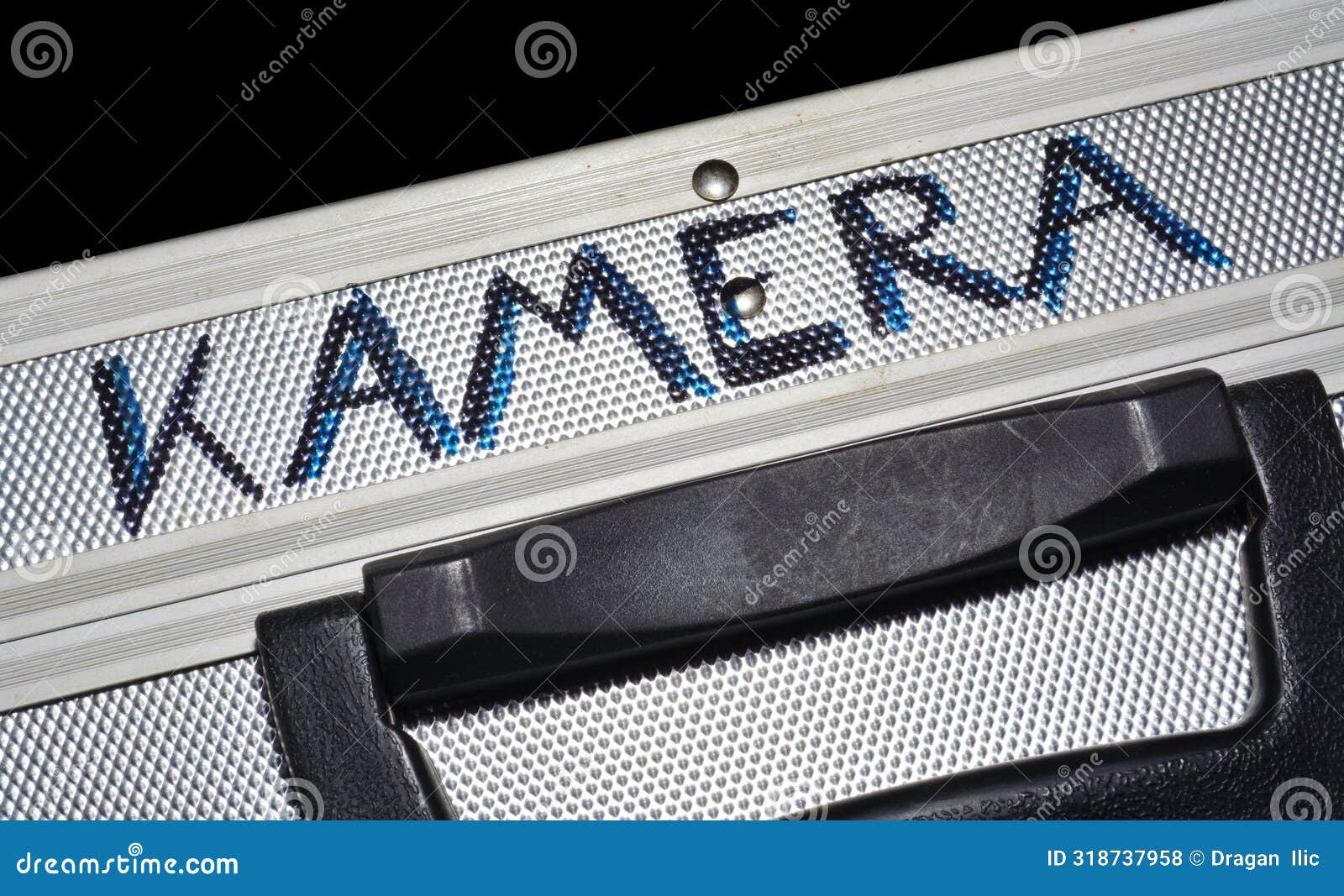 Metallic Camera Briefcase with "Kamera" Handwritten Stock Photo - Image ...