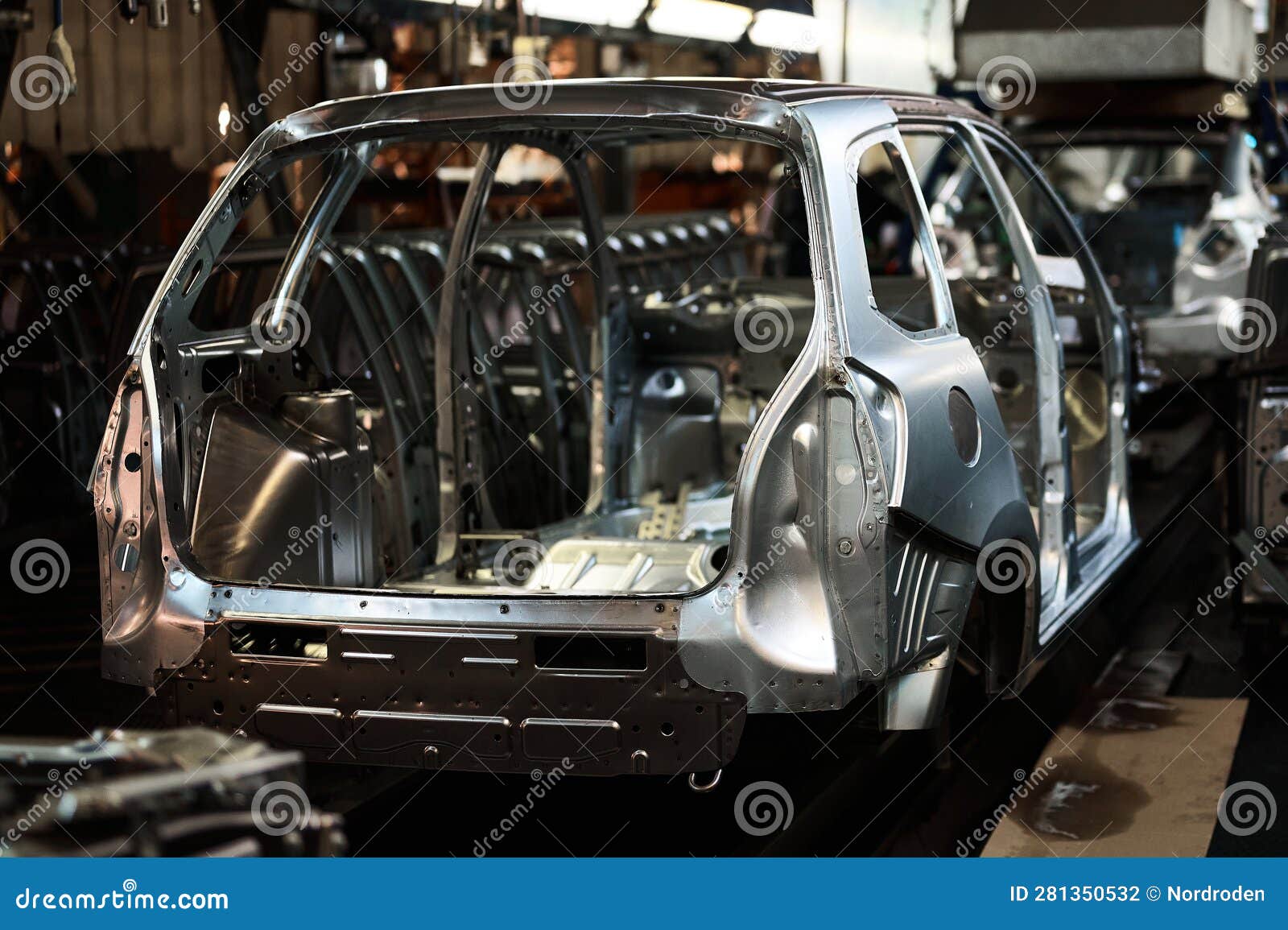 Metallic Car Carcasses on Conveyor in Assembling Workshop Stock Photo ...