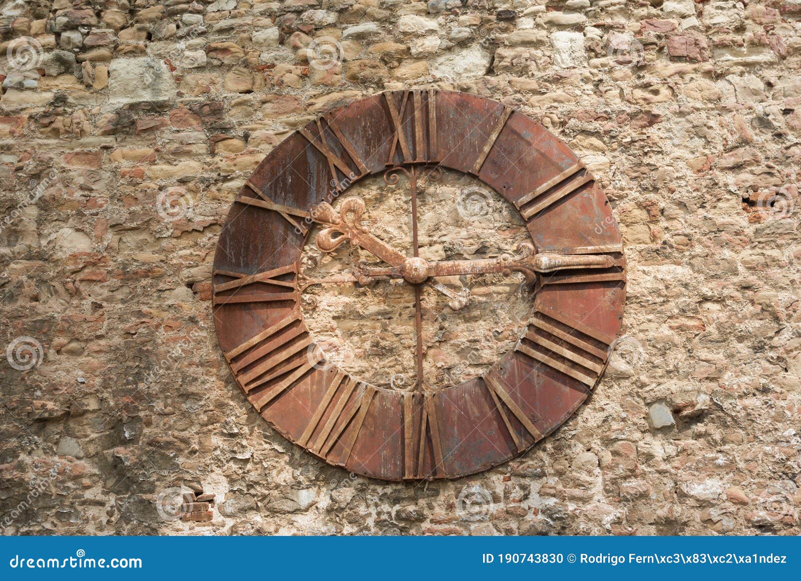 Metallic Clock on a Stone Wall Stock Photo - Image of clock, landmark ...