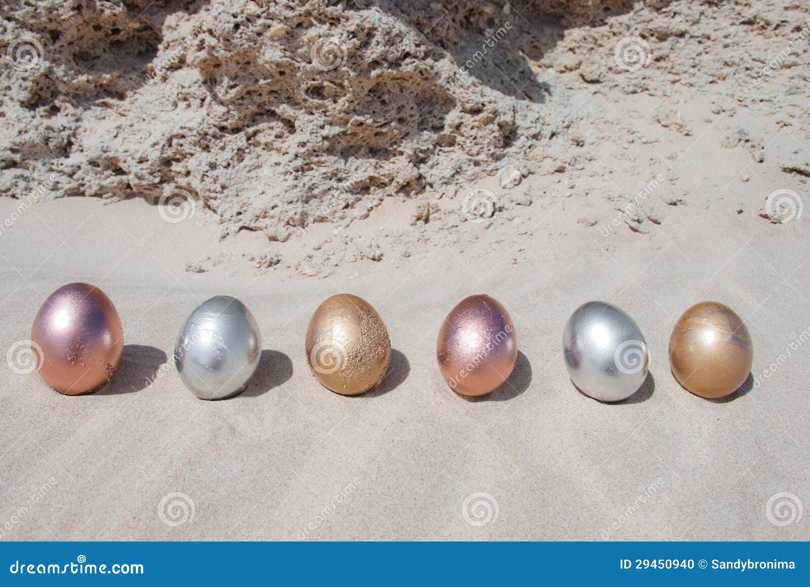 Metallic Easter Eggs in the Sand Stock Photo - Image of africa ...