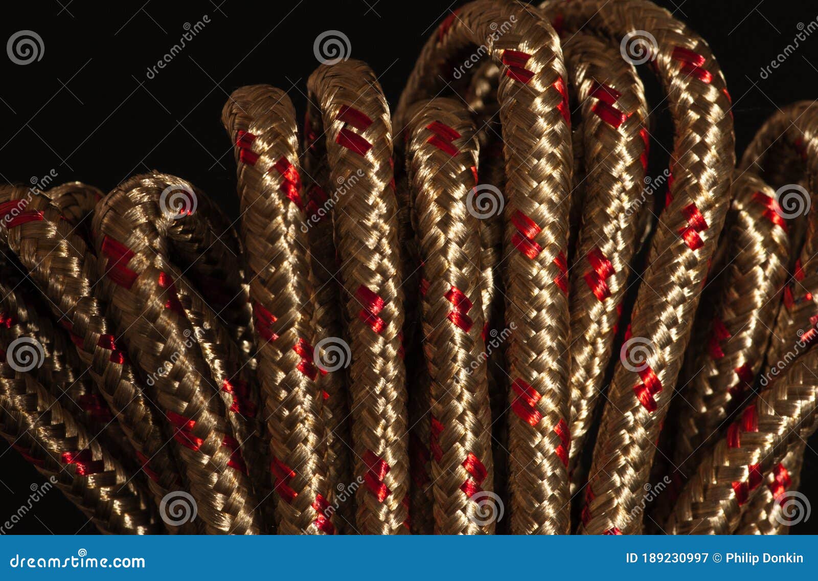 Metallic gold and red rope stock image. Image of asia - 189230997