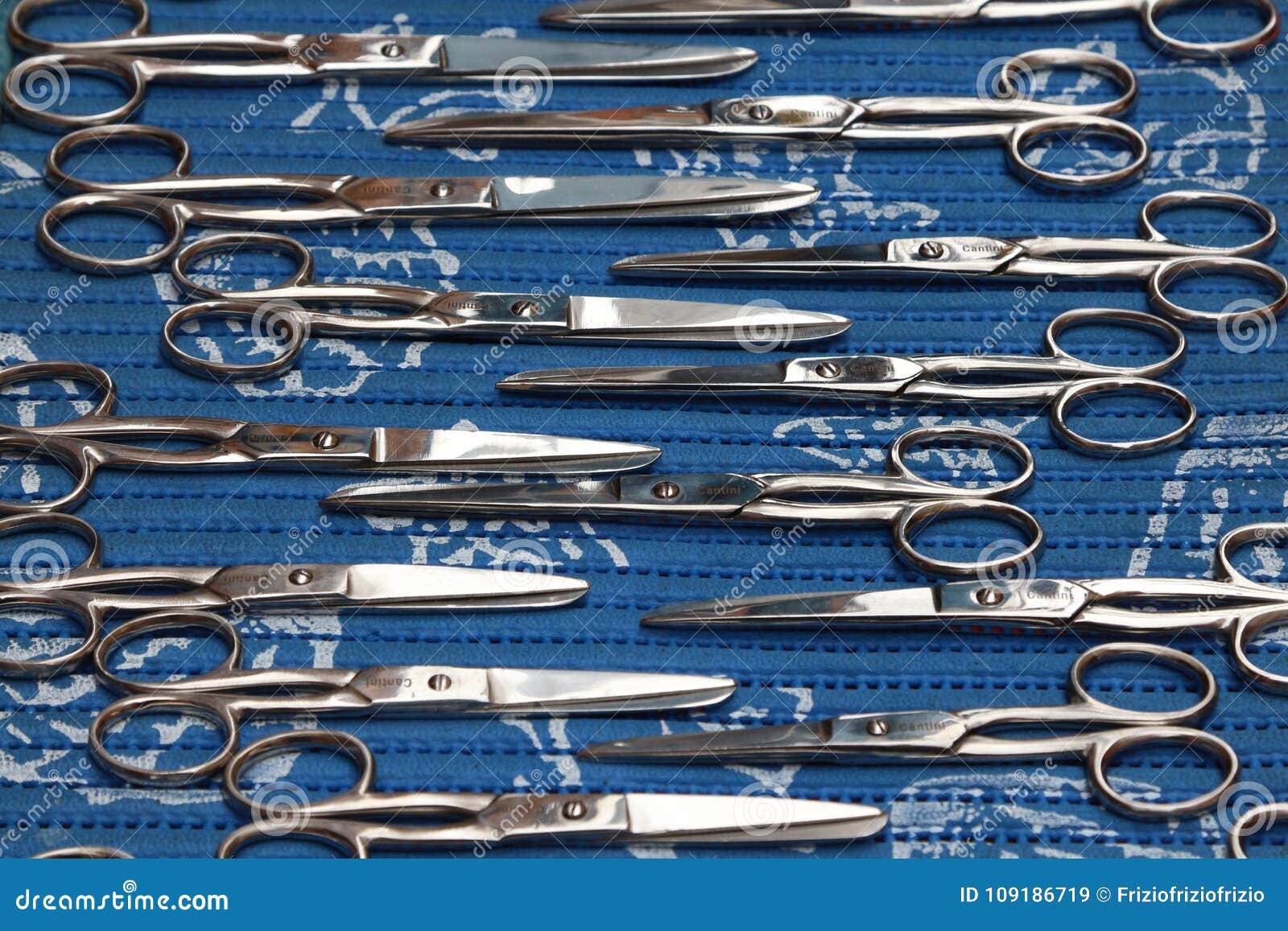 Metallic Scissors on the Blue Background Stock Image - Image of ...