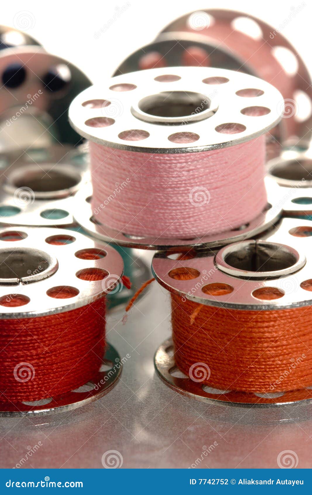 Metallic spools of thread stock photo. Image of macro - 7742752