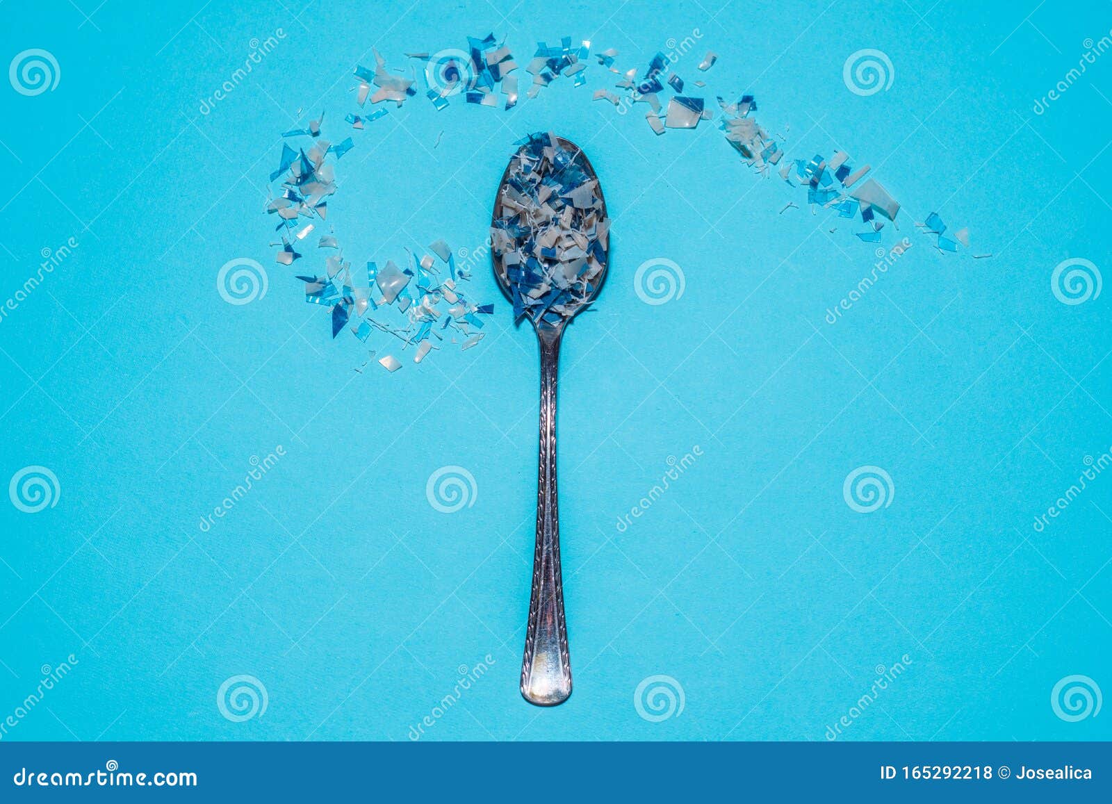Spoon with microplastics stock photo. Image of blue - 165292218