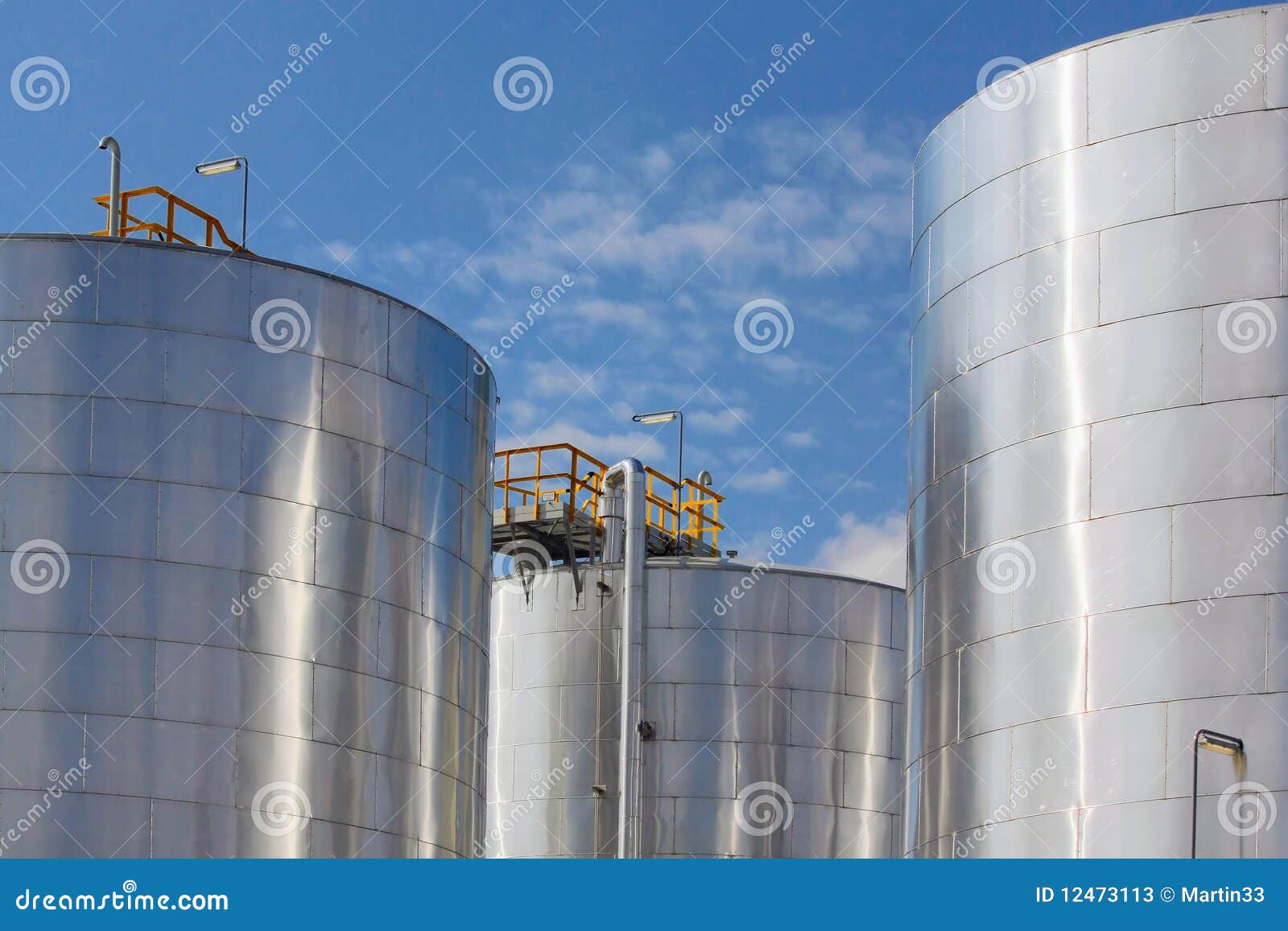 Metallic storage tanks stock image. Image of store, liquid - 12473113