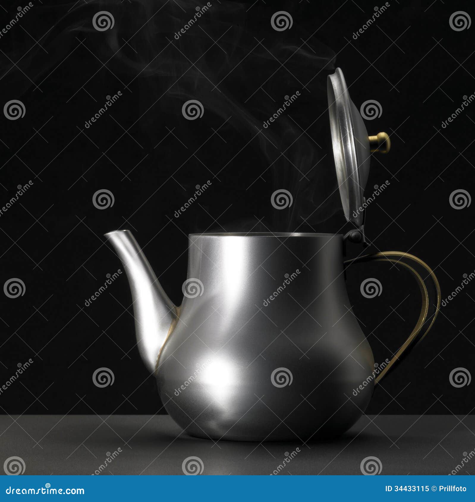 Metallic tea pot sideways stock image. Image of handle - 34433115