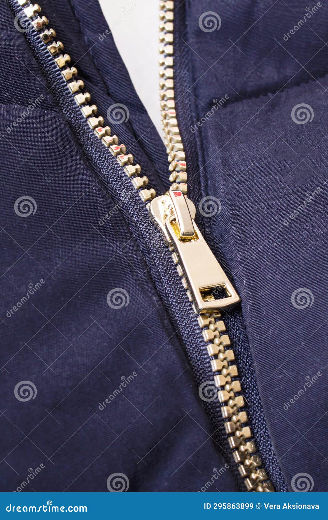 Yellow Zipper Tightly Closed Binding Together Two Layers Of Fabric ...