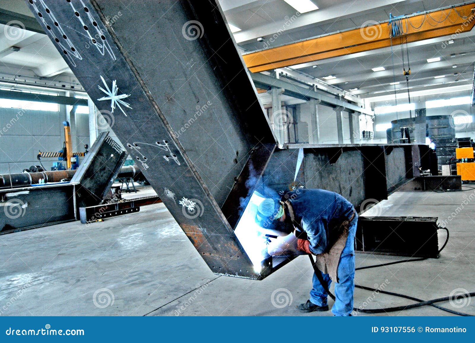 Metalwork Construction of Large Tubes with Workers Working Welding ...