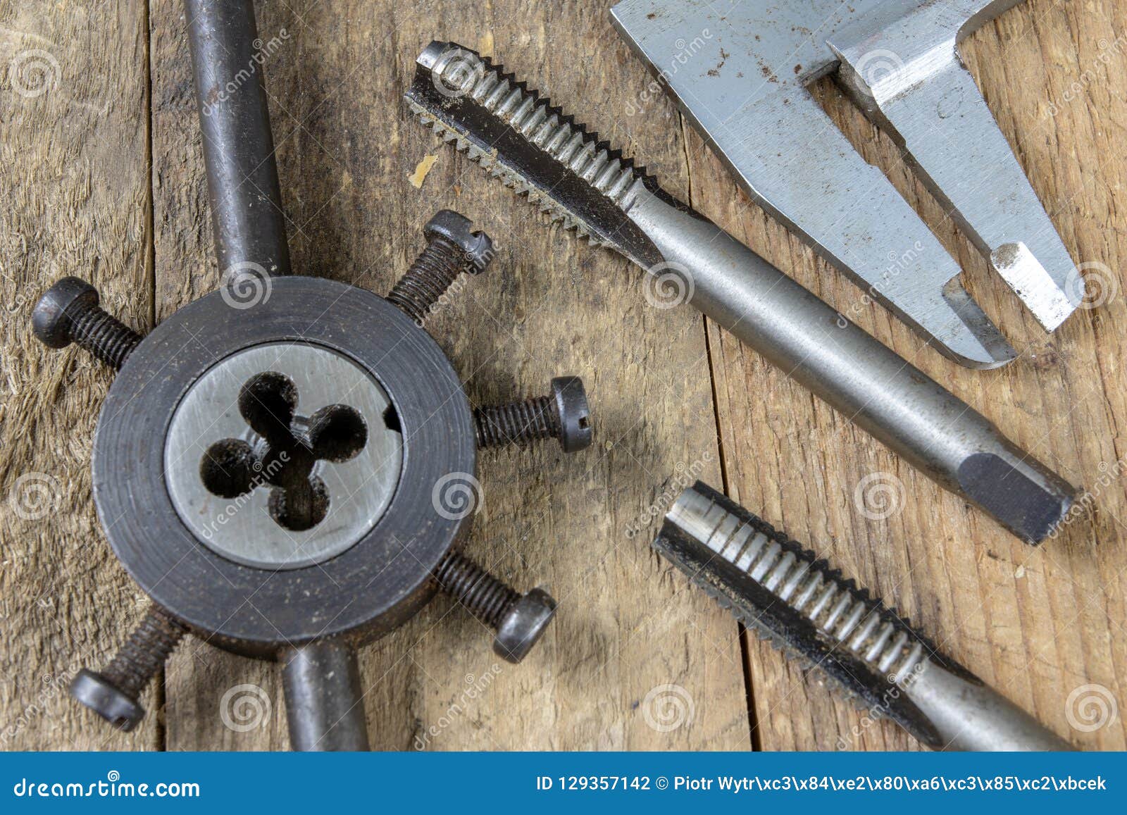 Metalwork Tools on the Workshop Table. Threading Dies and Taps I Stock ...