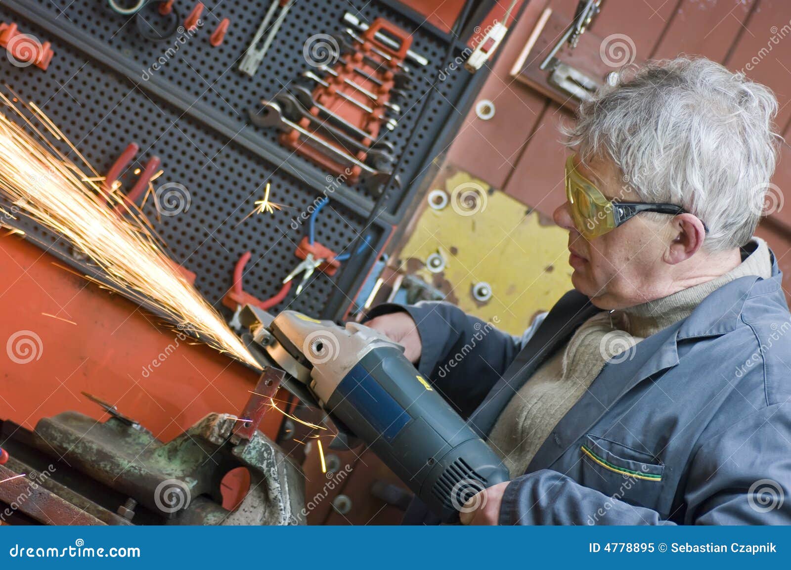 Metalworker and Electric Saw Stock Image - Image of hair, eyeglasses ...