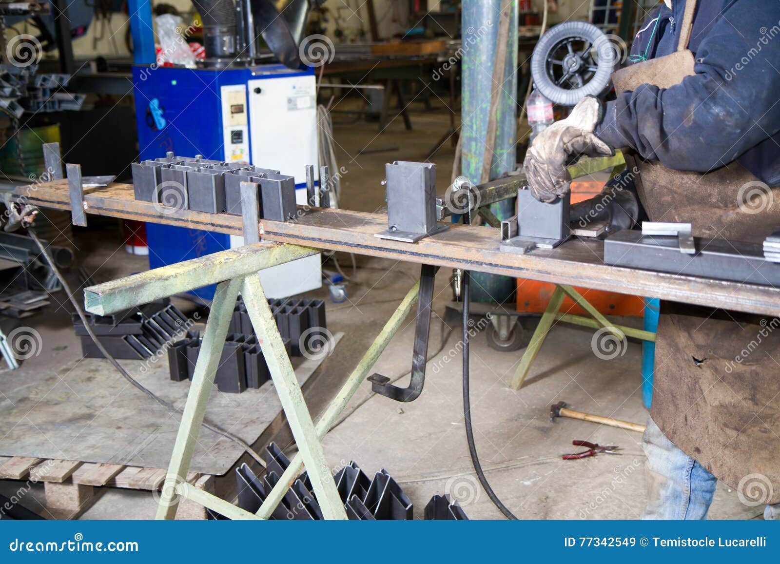 Metalworker at work stock image. Image of glow, labour - 77342549