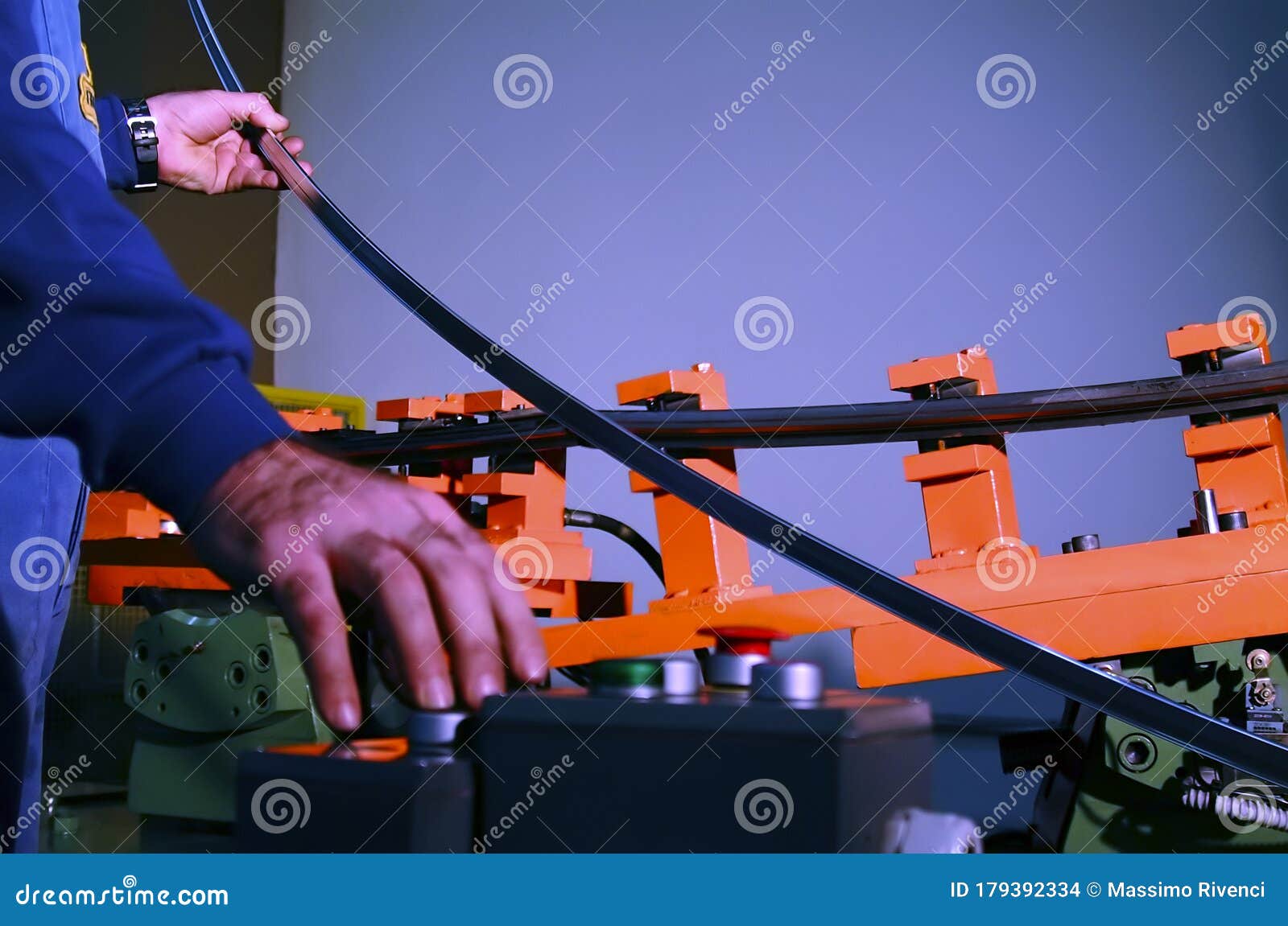 Metalworker is Working with a Bending Machine Stock Photo - Image of ...