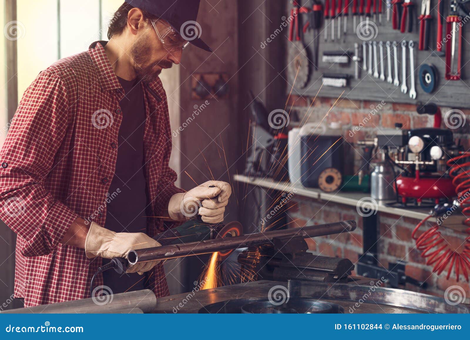 Metalworker Working in an Engineering Workshop Stock Photo - Image of ...