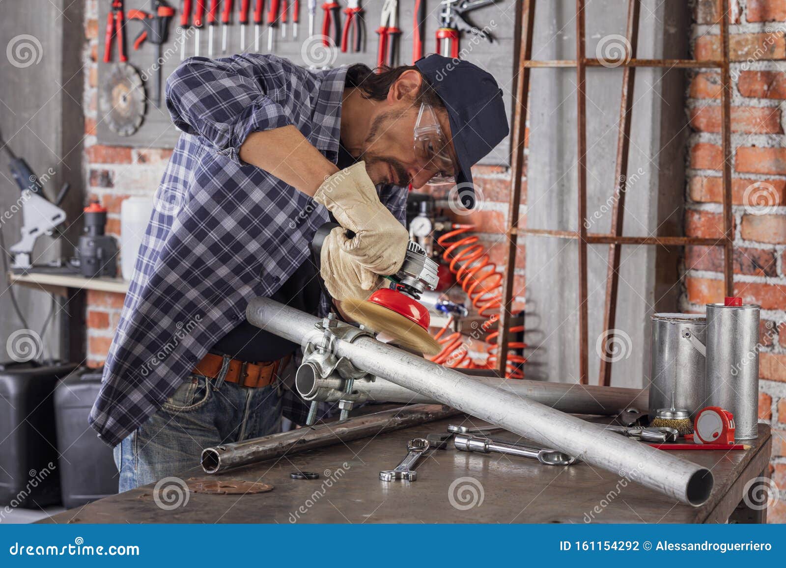 Metalworker Working on Steel Pipes Stock Photo - Image of power ...