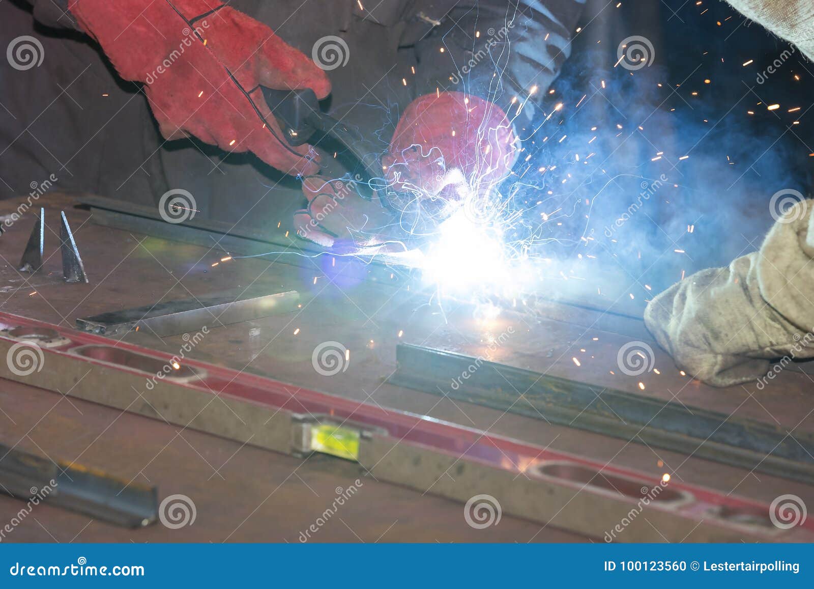 Metalworking Shop Workers Work Behind Machines and Apparatuses To ...