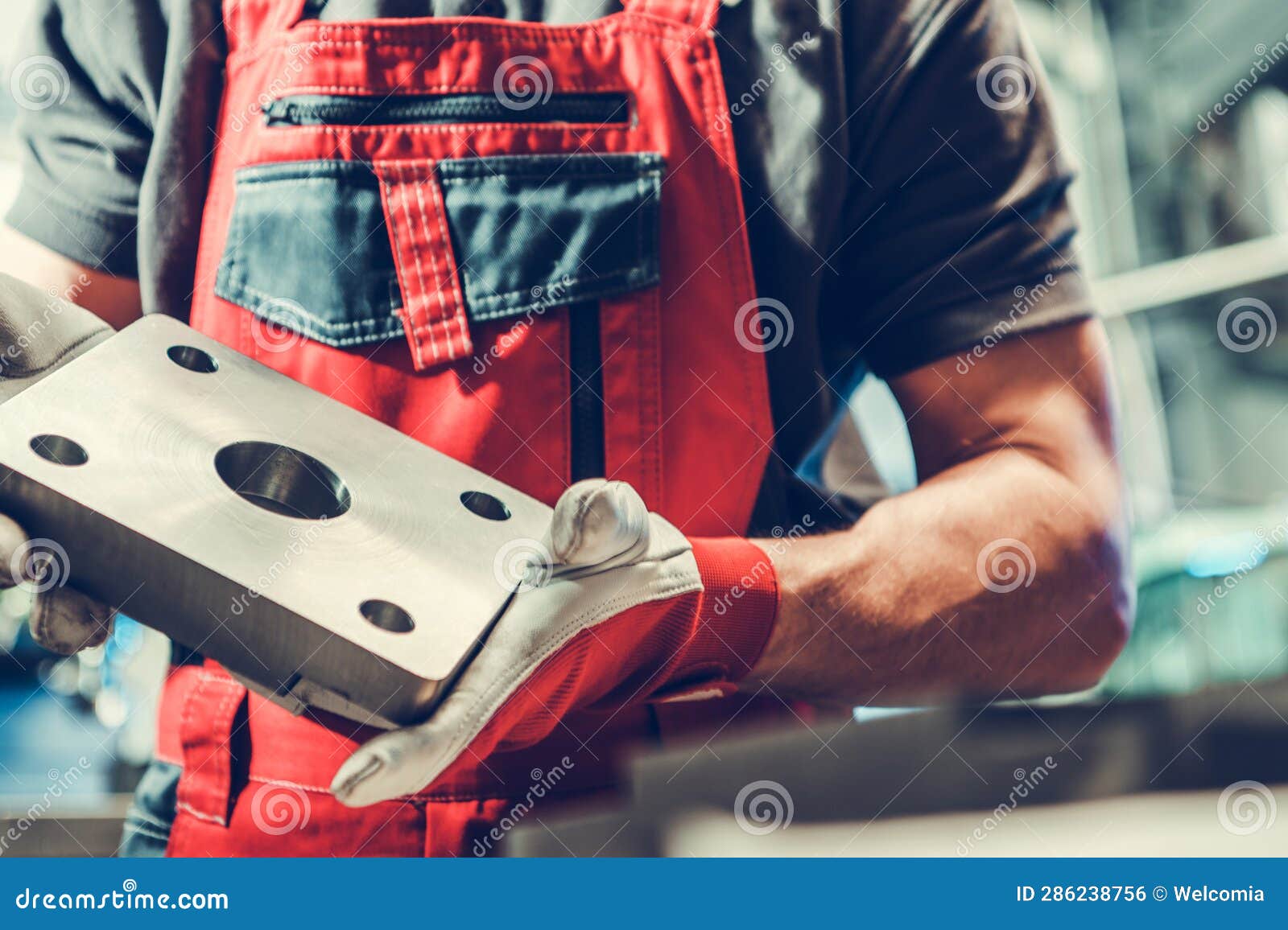 Metalworking Worker with Piece of Custom Made Metal Part Stock Photo ...