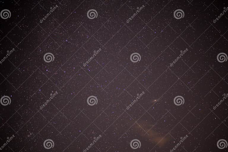 Meteor Shower during Perseid Curent. Andromeda Galaxy in the Night Sky ... Meteor Shower during Perseid Curent. Andromeda Galaxy in the Night Sky ...