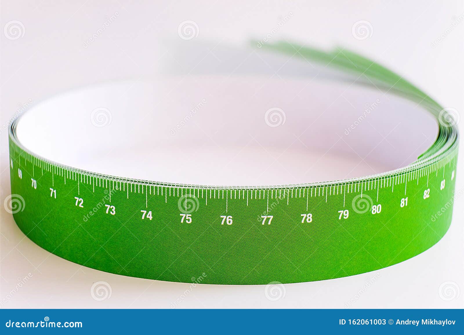 Meter Tape for Measuring Rolled into a Roll, on a Light Background ...